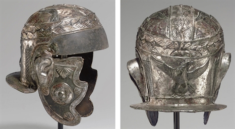 A ROMAN IRON AND TINNED BRONZE CAVALRY HELMET , CIRCA SECOND HALF OF ...