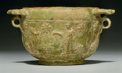 A ROMAN LEAD GLAZED POTTERY SKYPHOS , CIRCA 1ST CENTURY B.C./A.D ...