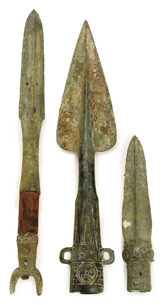 THREE CHINESE BRONZE WEAPONS AND A FINIAL, , WESTERN ZHOU DYNASTY (C ...