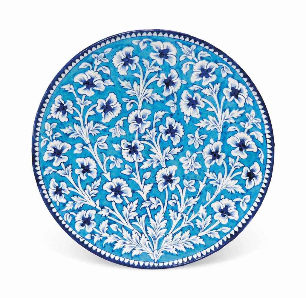 A LARGE MULTAN BLUE AND TURQUOISE POTTERY DISH , SINDH, PAKISTAN, LATE ...