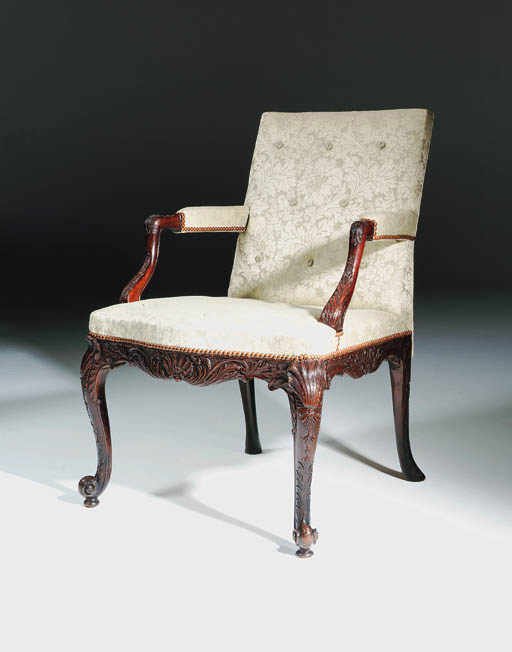 AN IRISH GEORGE II MAHOGANY LIBRARY OPEN ARMCHAIR