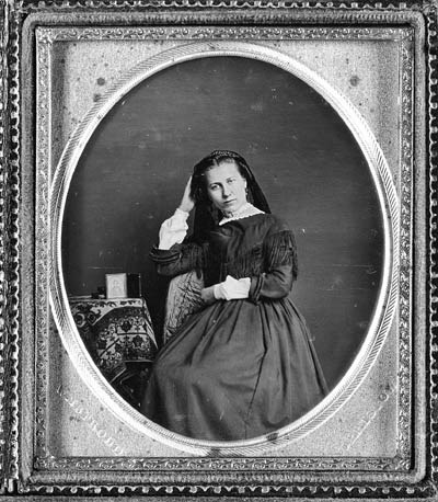 WILLIAM STROUD (active 1850-1878) , Young lady posing with a ...