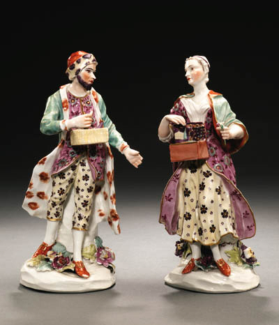 A PAIR OF DERBY (WILLIAM DUESBURY & CO.) FIGURES OF A JEWISH PEDDLER ...