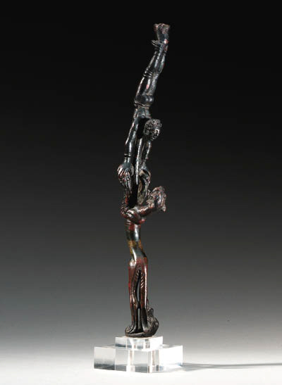 A ROMAN OR PARTHIAN BRONZE ACROBATIC GROUP