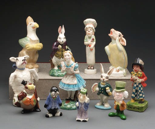 [PORCELAIN FIGURES, ETC.]. 12 hand-painted figures (11 ceramic and one ...