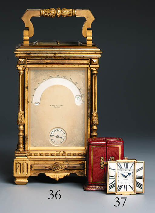 A French gilt-brass digital sector clock