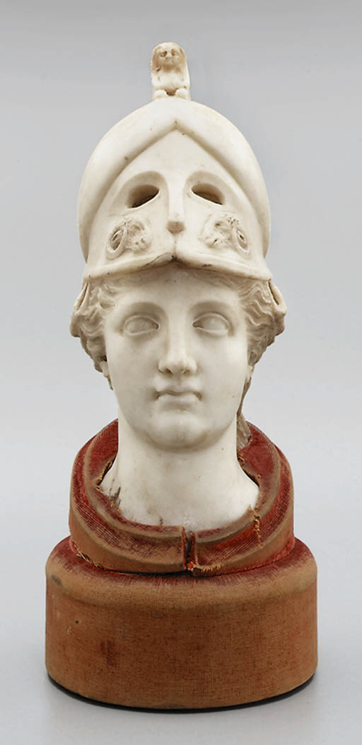 A CARVED MARBLE HEAD OF MINERVA