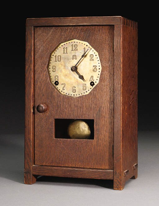 AN OAK MANTEL CLOCK , GUSTAV STICKLEY, CIRCA 1912 | Christie's
