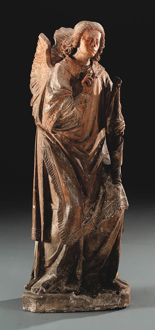 A FRENCH POLYCHROME-DECORATED STATUE OF THE ANGEL GABRIEL