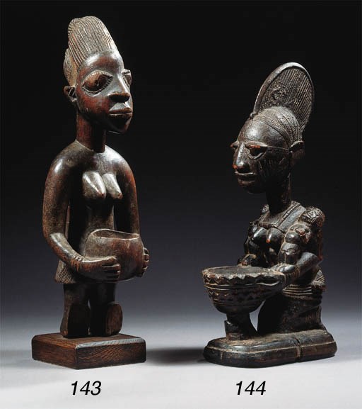 a fine yoruba female figure , BY A MEMBER OF THE IGBUKE FAMILY, OYO ...