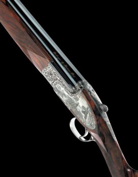 A FINE PEDRETTI-ENGRAVED 20-BORE (2¾IN) SINGLE-TRIGGER OVER-AND-UNDER ...