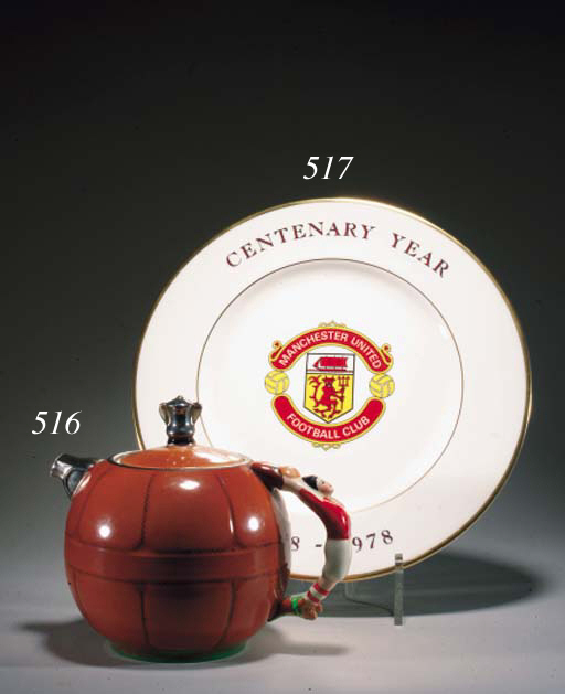 A Staffordshire pottery teapot, formed as a football, the detachable ...