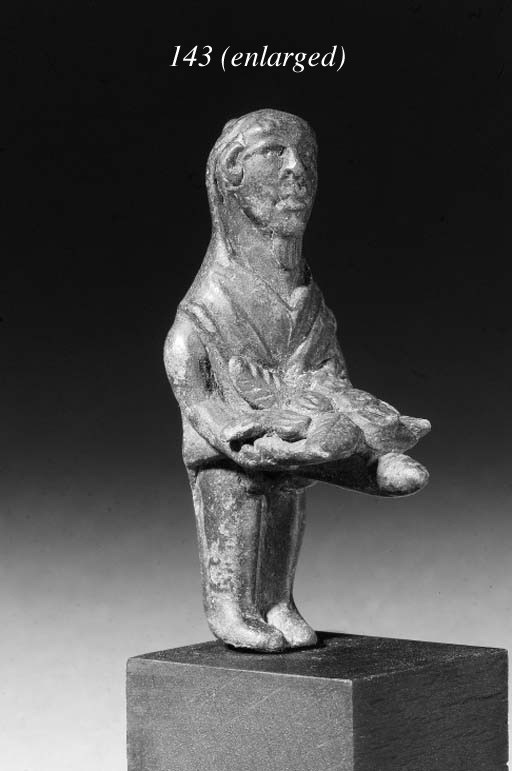 AN IBERIAN BRONZE FIGURE OF ITHYPHALLIC PRIAPUS