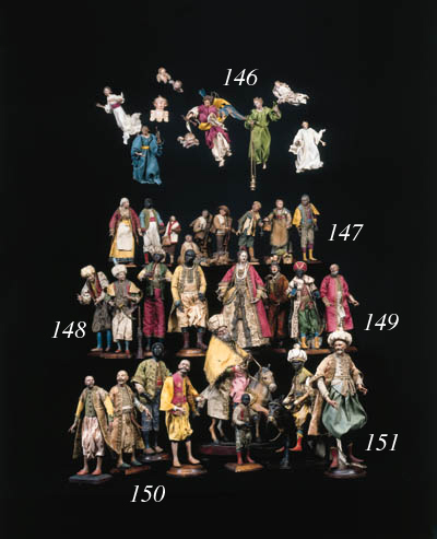 A GROUP OF NINE FIGURES