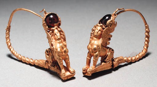 A PAIR OF GREEK GOLD AND GARNET SPHINX EARRINGS , HELLENISTIC PERIOD ...