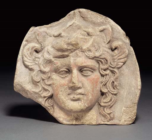 A GREEK TERRACOTTA ANTEFIX , TARANTINE, CIRCA MID 4TH CENTURY B.C ...