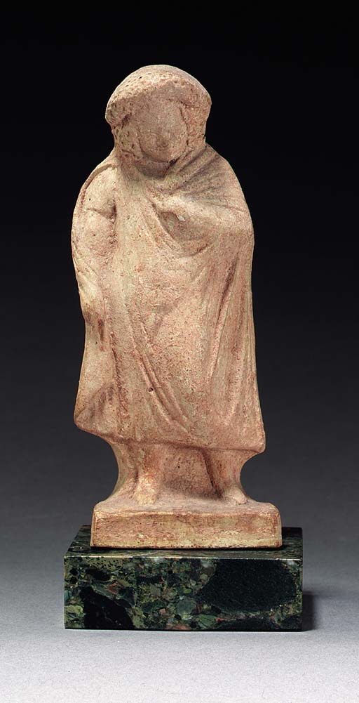 A GREEK TERRACOTTA ANTEFIX , TARANTINE, CIRCA MID 4TH CENTURY B.C ...