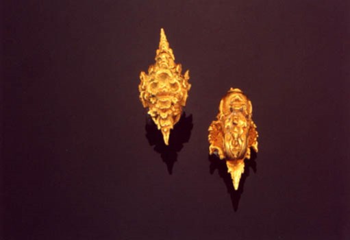 A PAIR OF CLASSICAL JAVANESE EAR ORNAMENTS | Christie's