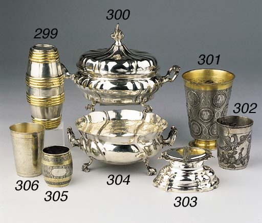 A parcel-gilt German silver double-beaker