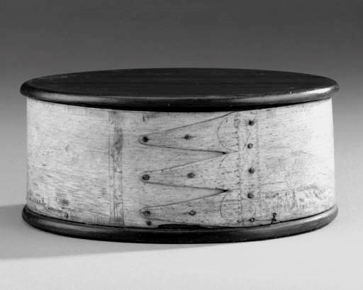 A scrimshaw decorated whale bone oval ditty box | Christie's