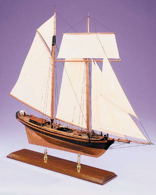 A detailed fully rigged display model of the American armed topsail ...