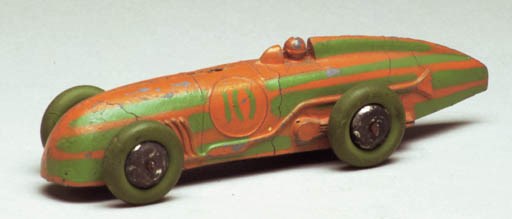 A pre-war Dinky orange and green 'Humbug' pattern 23a Racing Car ...