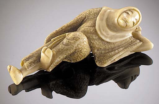 An ivory netsuke of a fox-woman19th Century | Christie's