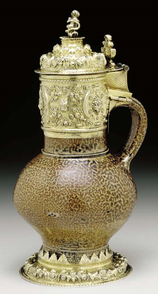 AN ELIZABETH I SILVER-GILT MOUNTED TIGERWARE JUG