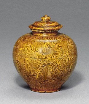 A Rare Small Amber-Glazed Marbled Pottery Jar and Cover