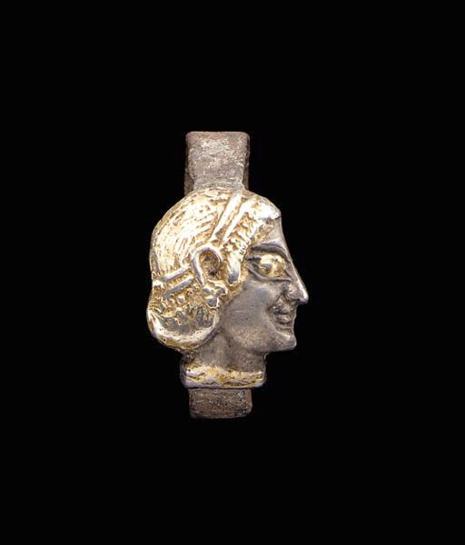 A GREEK PARCEL GILT SILVER FINGER RING , ARCHAIC PERIOD, CIRCA LATE 6TH ...