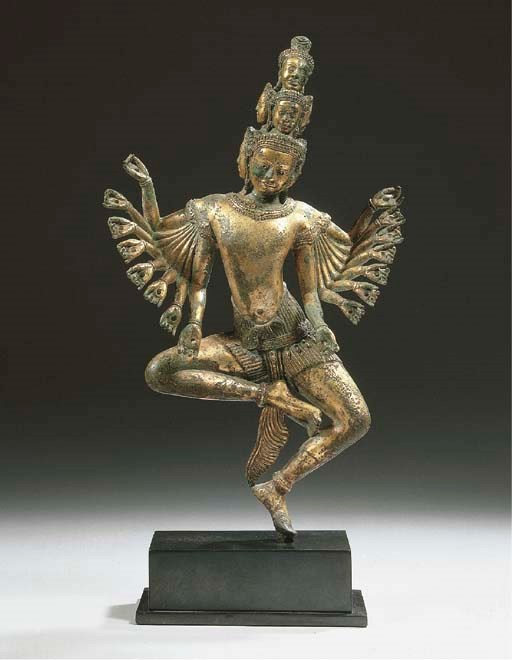 a rare khmer, baphuon style, gilt-bronze figure of hevajra , 11TH ...