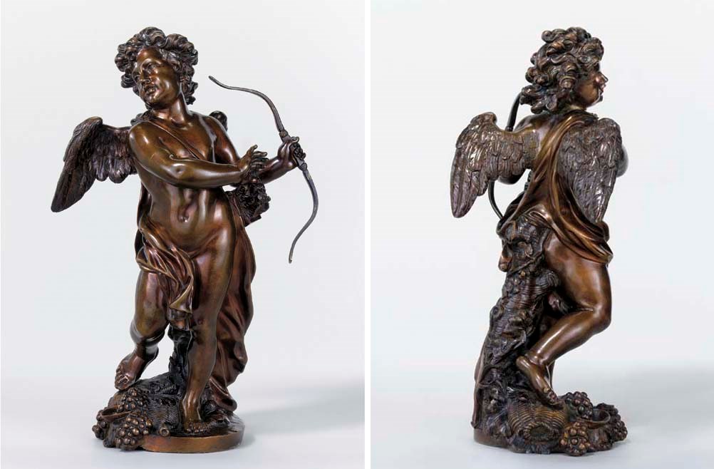 A BRONZE FIGURE OF CUPID