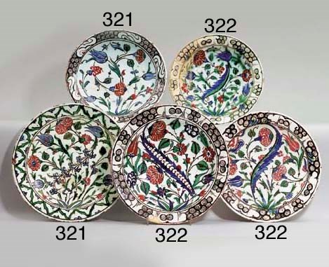 TWO IZNIK POTTERY DISHES , OTTOMAN TURKEY, CIRCA 1620-30 | Christie's