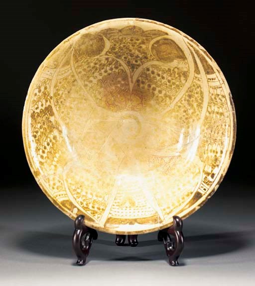 An Abbasid polychrome lustre pottery bowlSamarra, Mesopotamia, 9th ...