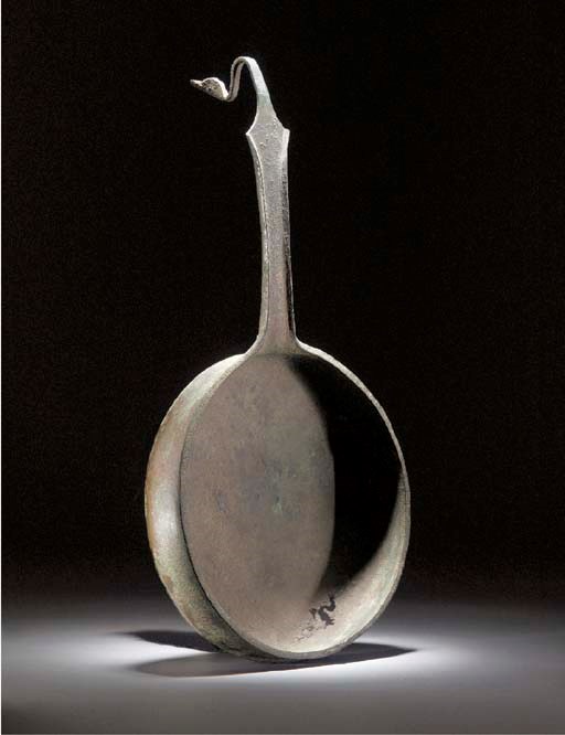 A ROMAN BRONZE SHALLOW PAN , CIRCA 1ST CENTURY B.C. | Christie's