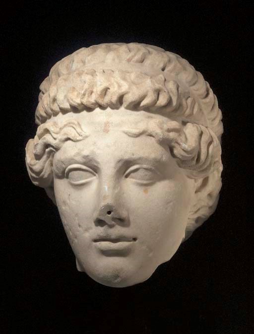 A ROMAN MARBLE IDEALISED MALE HEAD , 1ST-2ND CENTURY A.D. | Christie's
