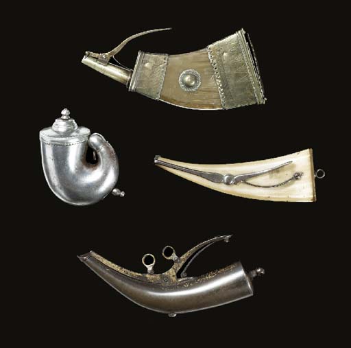 A BRASS-MOUNTED COW-HORN POWDER-FLASK, AN IRON-MOUNTED GERMAN HORN ...