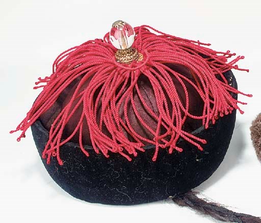 A mandarin's winter ji guan hat, the crown of purple satin decorated ...