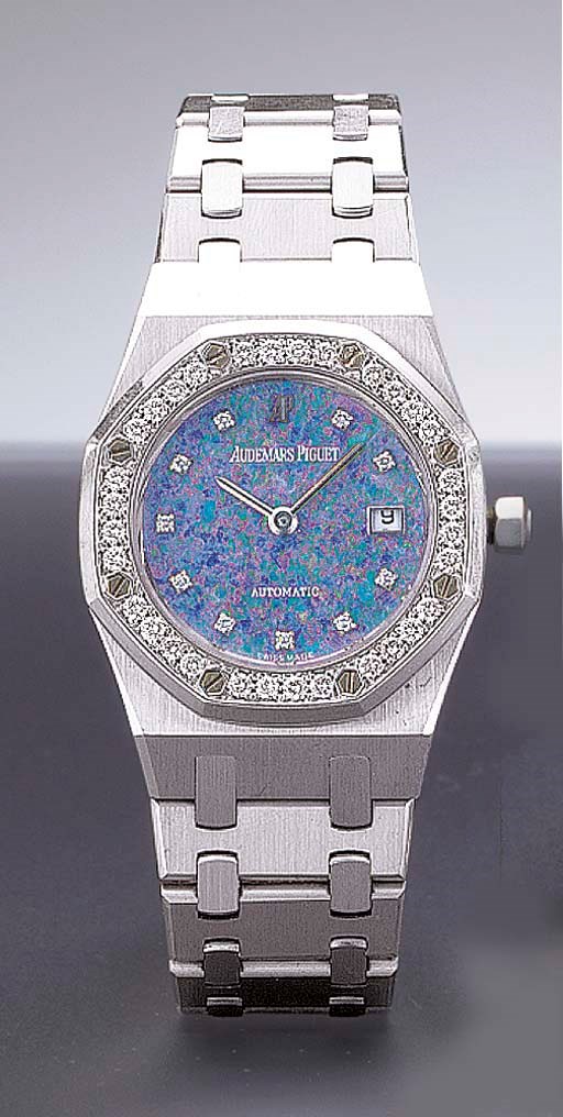 Audemars Piguet. A lady's 18K white gold self-winding diamond-set ...
