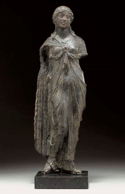 A LATE HELLENISTIC OR EARLY ROMAN BRONZE FIGURE OF ISIS