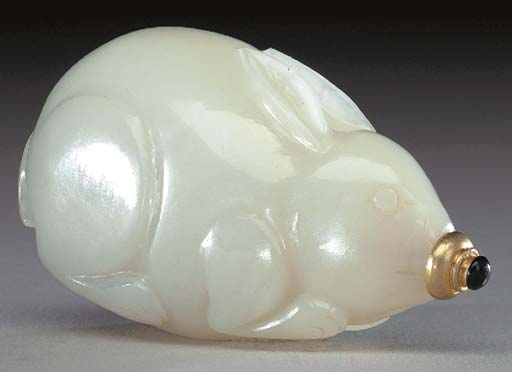 A RARE CARVED WHITE JADE RABBIT BOTTLE