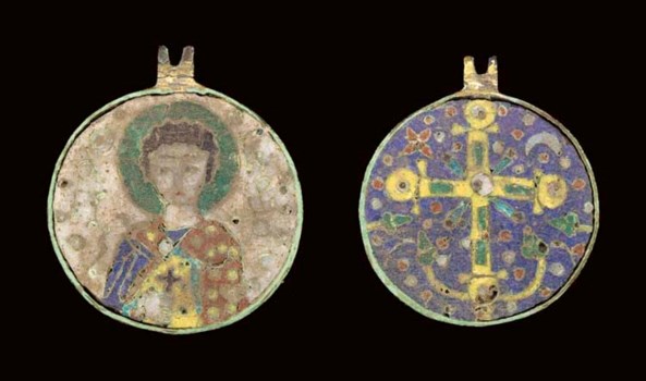 A BYZANTINE GILT BRONZE AND ENAMEL MEDALLION , CIRCA EARLY 12TH CENTURY ...