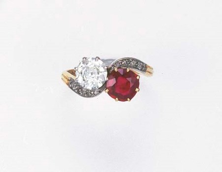 A DIAMOND AND RUBY TWO-STONE RING | Christie's