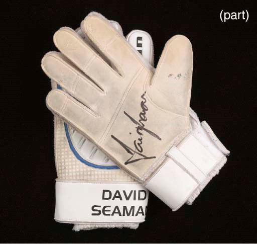 A pair of Umbro goalkeeper gloves, worn by David Seaman, both gloves ...