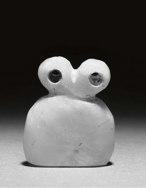 A SYRIAN OR MESOPOTAMIAN ALABASTER 'EYE' IDOL