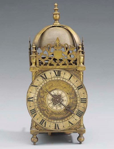 An English brass lantern clock with alarm, mid 16th century | Christie's