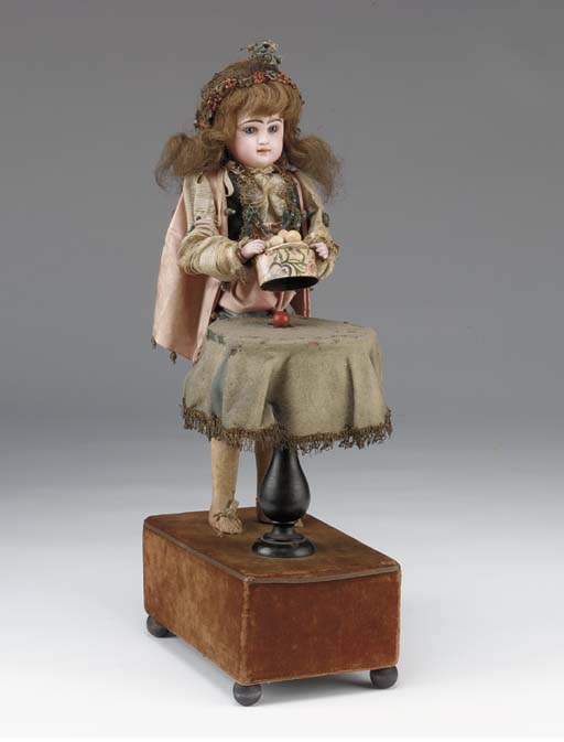A Lambert clown guitar player automaton | Christie's