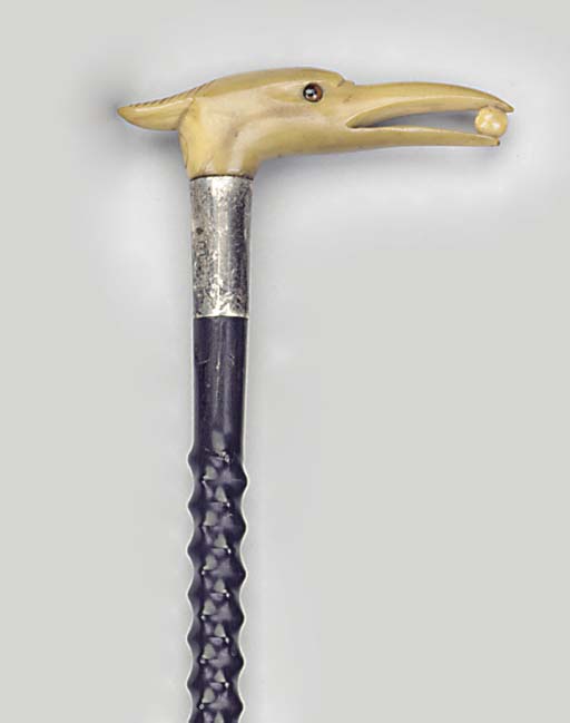 A Victorian horn and silver mounted gnarled ebony cane