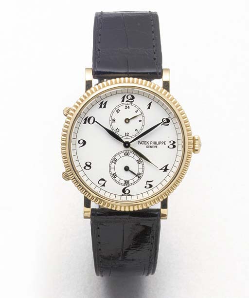 PATEK PHILIPPE: AN 18ct. YELLOW GOLD DUAL TIME ZONE WRISTWATCH WITH 24 ...