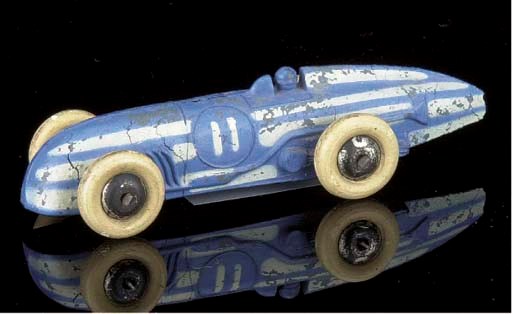 A pre-war Dinky blue and white 'humbug' pattern 23a Racing Car | Christie's